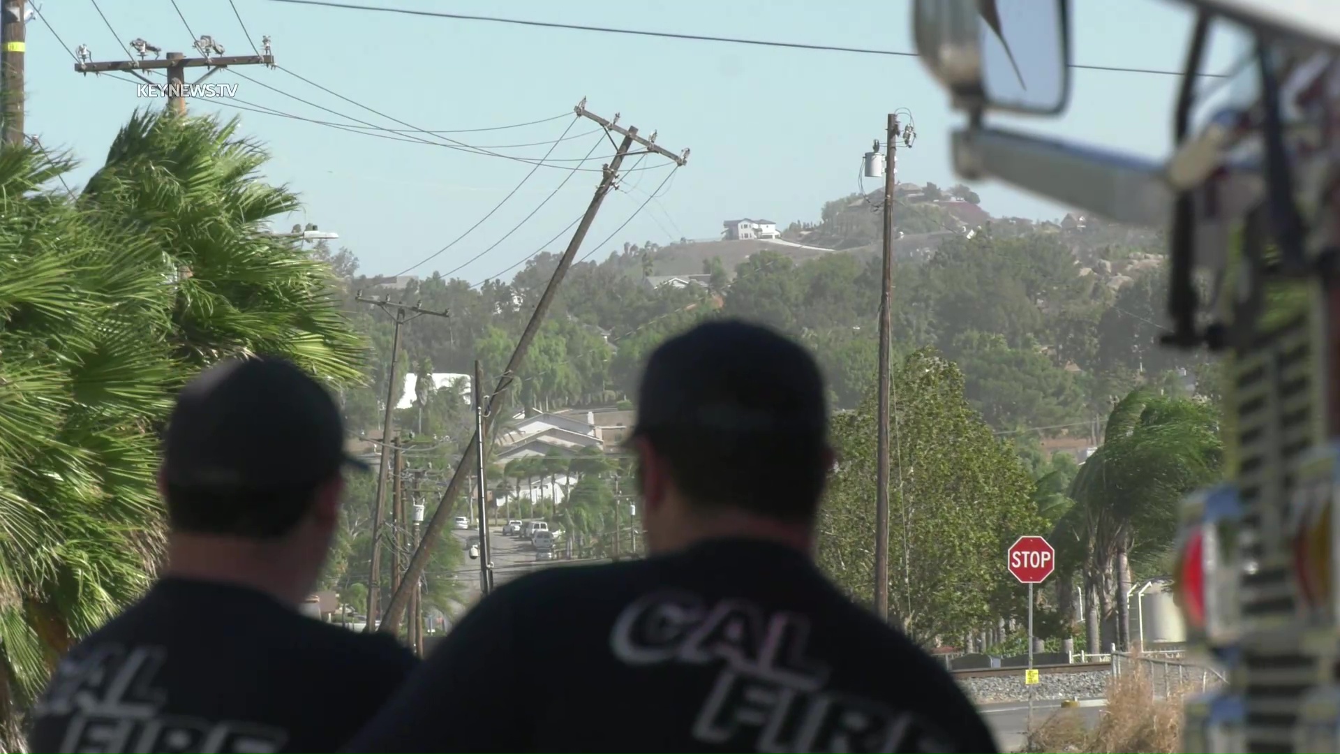 Utility Pole Snapped by Strong Winds Prompts Closure of Busy Street in ...